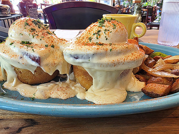 Eggs Benedict reimagined with architectural ambition. These towering beauties draped in hollandaise are what breakfast dreams are made of.