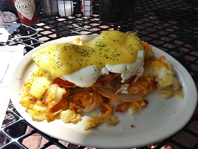 Eggs Benedict reimagined with a Florida twist. Those hash browns underneath create the crispy foundation every good breakfast deserves.