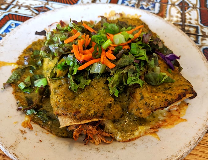 Enchiladas verde swimming in that gorgeous green sauce – this is what culinary dreams are made of, folks.