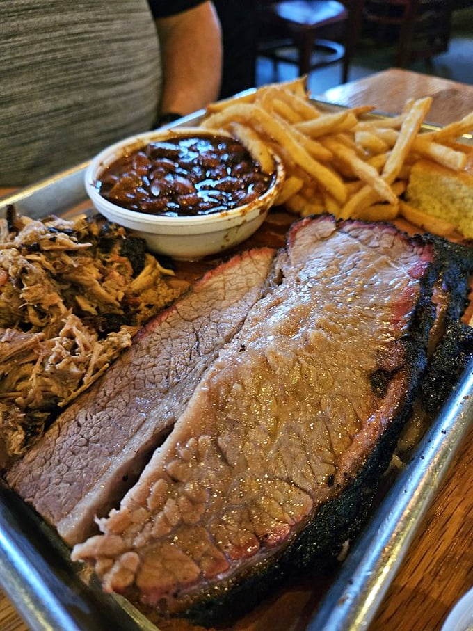 Brisket so perfectly rendered it makes Texas nervous. That smoke ring isn't just pink—it's the barbecue equivalent of a Michelin star.