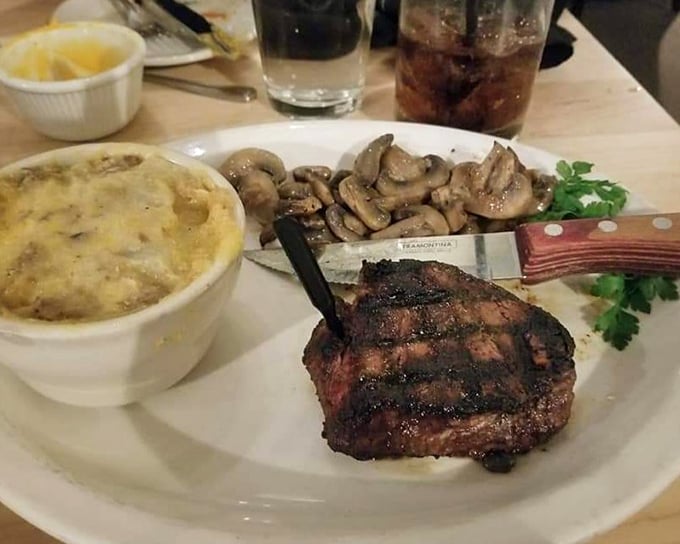 This filet mignon with mushrooms isn't just dinner—it's a carnivore's sonnet. The grill marks alone tell you someone in that kitchen really cares.
