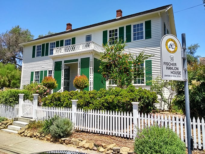 The Fischer-Hanlon House stands as a perfect example of how white picket fences never went out of style for good reason.