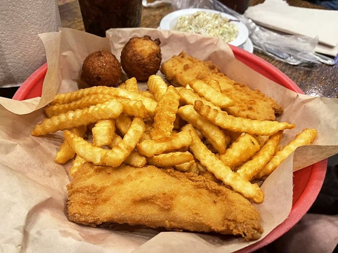 Fish and chips done right – crispy exterior, flaky interior, and those crinkle-cut fries that somehow taste better than regular ones.