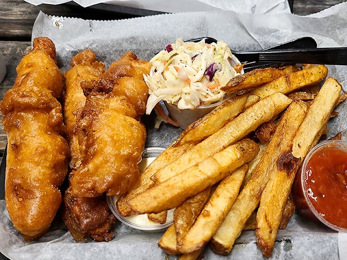 Golden-battered fish, hand-cut fries, and coleslaw that doesn't come from a bucket—the holy trinity of beachside dining done right. 