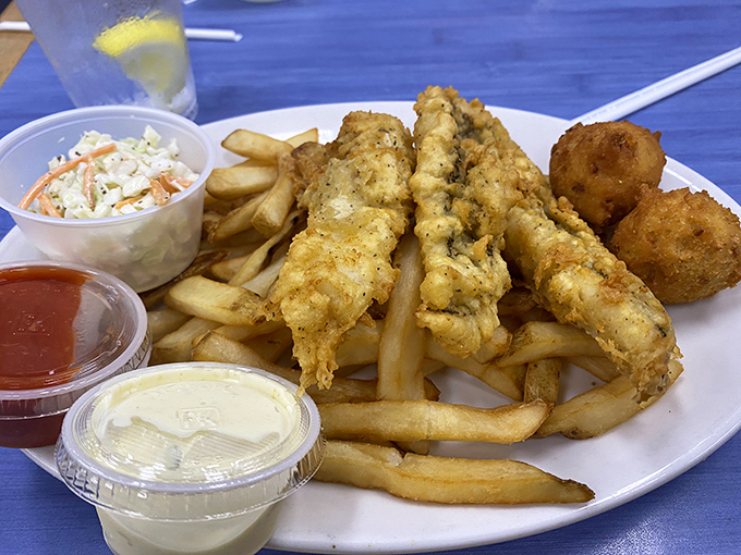 Fish and chips done right – crispy exterior giving way to flaky white fish that would make even British pubs jealous.