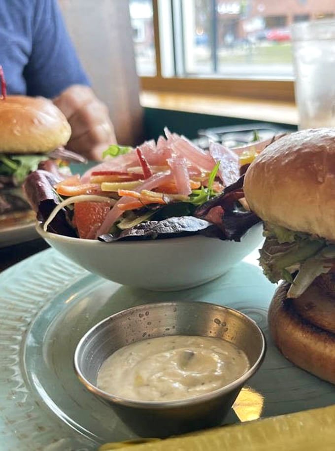A proper sandwich requires proper balance—crisp vegetables, savory protein, and a sauce worth licking off your fingers when nobody's looking.
