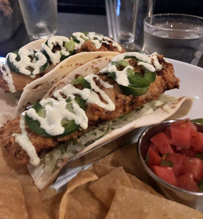 These fish tacos aren't just a meal—they're a beach vacation wrapped in a tortilla, with crispy fish and creamy sauce playing in perfect harmony.