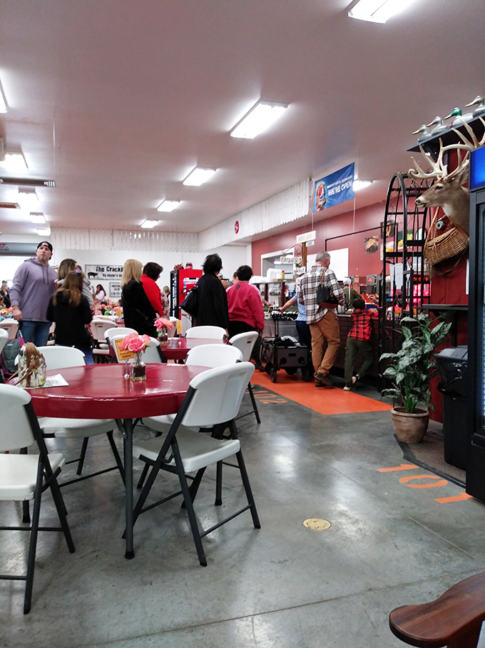 Where shopping meets sustenance—red tables invite weary bargain hunters to refuel before diving back into the marketplace madness.