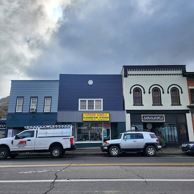 Downtown storefronts maintain their mid-century charm, where the Food King promises Chinese cuisine without big-city prices or pretension.