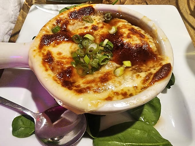 French onion soup that's worth the inevitable cheese pull photo-op. That golden crown of bubbling goodness is pure comfort in a crock.