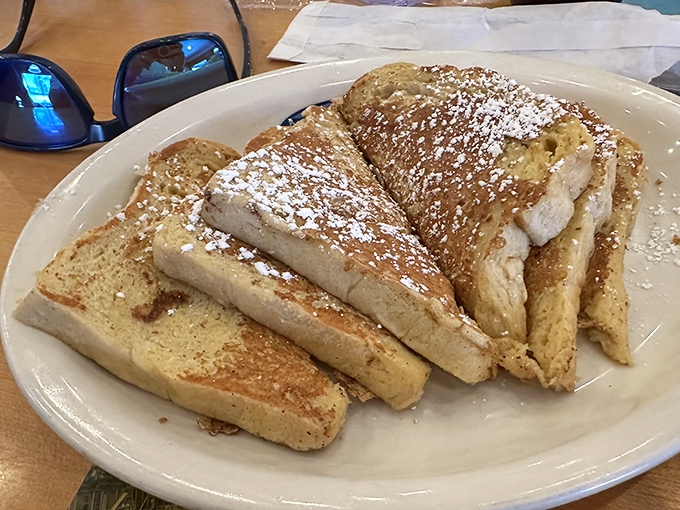 French toast that's dressed for success with a dusting of powdered sugar. Breakfast royalty that makes ordinary toast hang its head in shame.