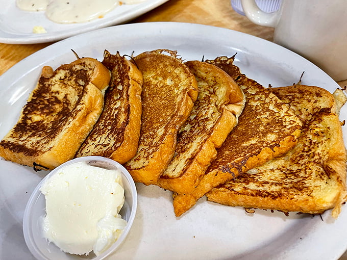 French toast that makes you understand why breakfast deserves its "most important meal" status. That side of butter isn't a suggestion—it's essential.