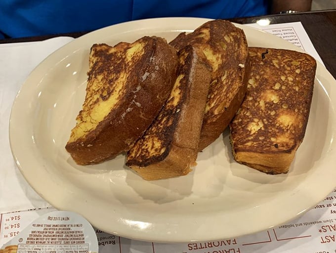 Challah French toast that makes ordinary breakfast feel like amateur hour—crispy edges, custardy center, and enough deliciousness to make you contemplate breakfast for dinner. 