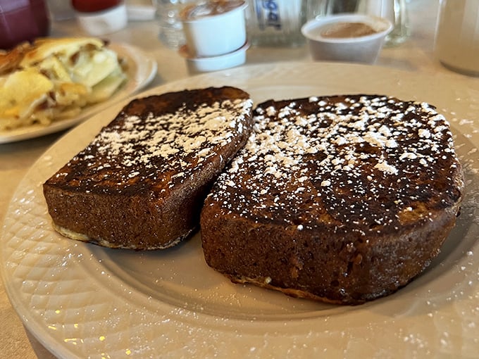 French toast that's achieved the golden-brown perfection we all attempt at home but rarely achieve. Dusted with powdered sugar like fresh snow.