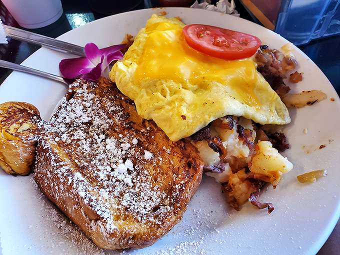 French toast and eggs living their best life together on one plate—the breakfast equivalent of finding both a parking spot AND a short line.