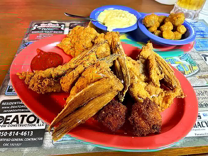Not just any fried seafood platter—this is the Florida equivalent of striking gold. Those hushpuppies are the perfect supporting cast.
