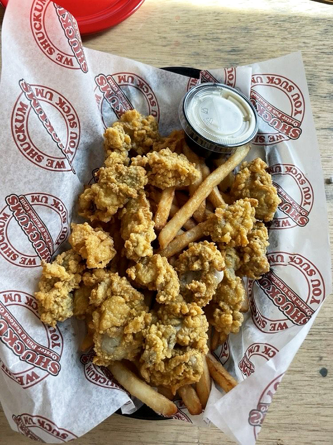 Fried oysters and fries—the beach vacation of comfort foods. Crispy on the outside, tender within, they're like little nuggets of the Gulf wrapped in crunchy hugs.
