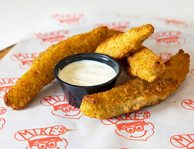 Golden-fried pickle spears that shatter with each bite—the perfect marriage of tangy and crispy that you never knew you needed.