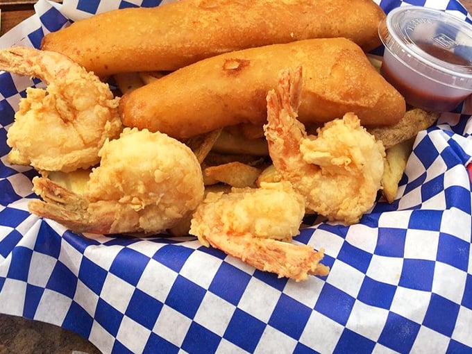 Butterflied shrimp that could double as golden nuggets of pure joy – crispy, substantial, and absolutely irresistible.