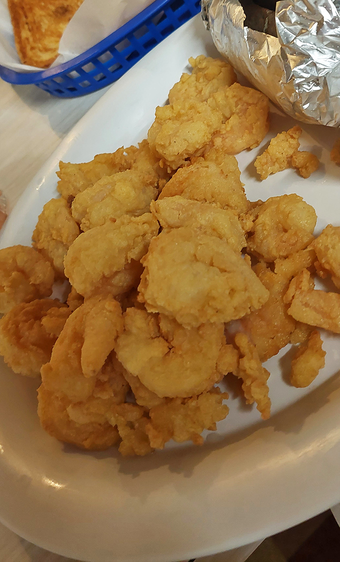 Crispy fried shrimp that snap with each bite, paired with potato wedges that put ordinary fries to shame. Simple food done extraordinarily well.