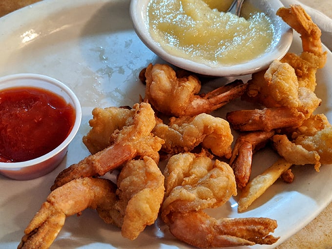 These golden-battered shrimp aren't just fried—they're transformed into crunchy treasures from the Chesapeake, complete with dipping adventures.