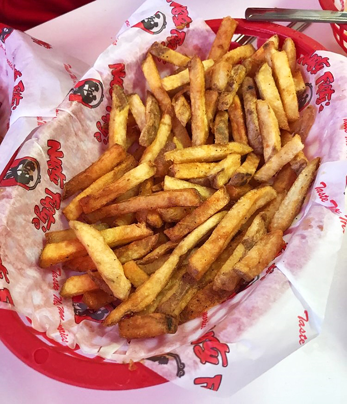 These aren't just french fries—they're golden happiness sticks that make you wonder why salads even exist in the first place.