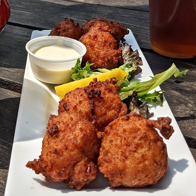Golden orbs of happiness that crunch like nature's bubble wrap. These fritters are what happens when seafood decides to dress up for a special occasion.