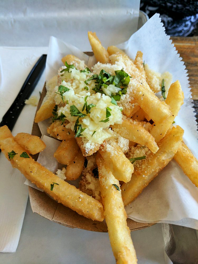 These aren't just garlic parmesan fries – they're what regular fries dream of becoming when they grow up. The perfect sidekick to seafood stardom.