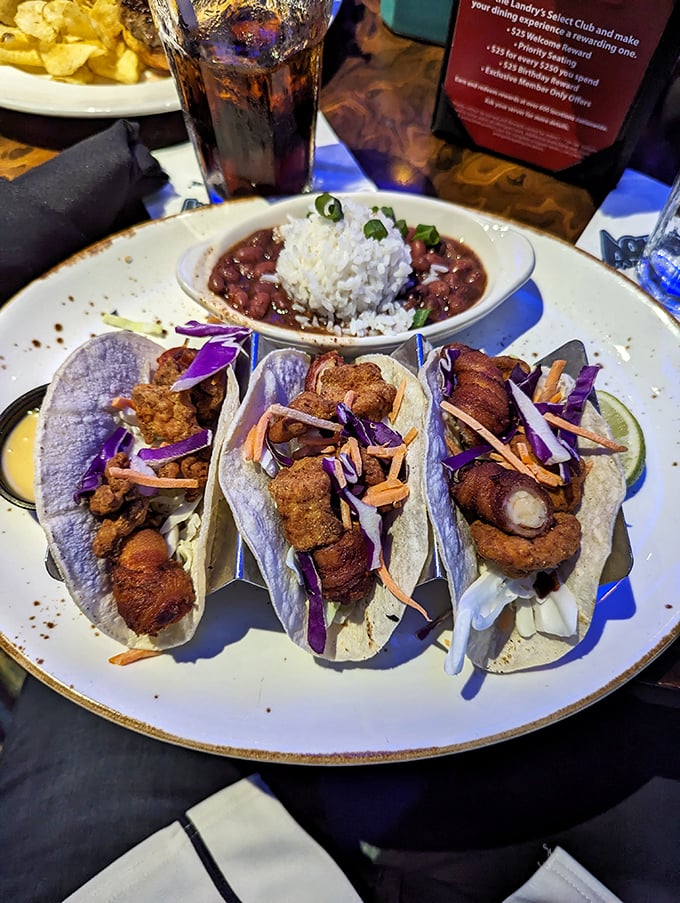 These tacos are having an identity crisis in the best possible way. Fried gator meets shrimp in a tortilla – it's the unexpected friendship story we need.