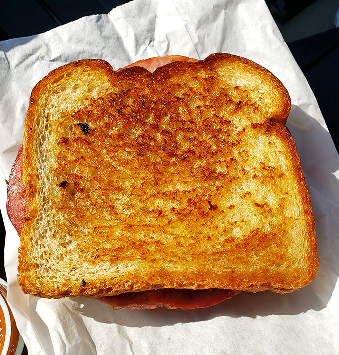 Golden-brown perfection that would make your grandmother nod in approval—this grilled cheese speaks the universal language of comfort.
