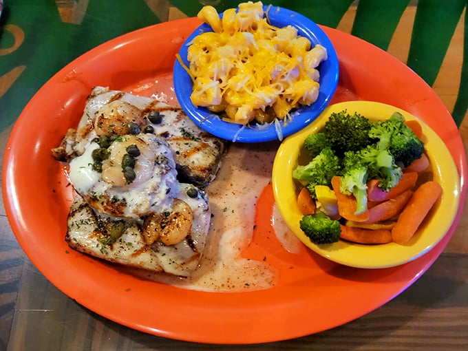 Grilled mahi that makes you wonder if mermaids have been keeping this recipe secret for centuries. The mac and cheese isn't playing backup—it's co-headlining.