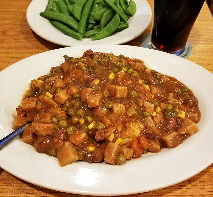 A hearty Guinness beef stew that doesn't just warm your stomach but hugs your soul—comfort food that could make even a summer day feel cozy.