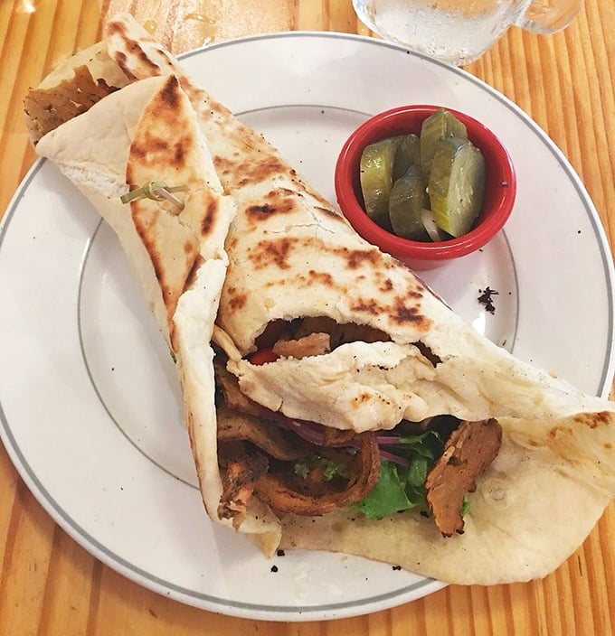 This vegan gyro doesn't just imitate the classic—it creates its own legacy of flavor, wrapped in warm flatbread with a side of perfectly brined pickles.