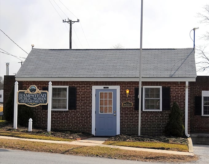 The Hampstead Public Works Department – where small-town efficiency meets brick-and-mortar charm. No bureaucratic mazes here, just neighborly service.