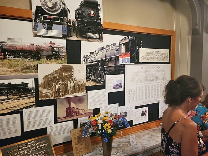 History doesn't just ride these rails—it's documented on these walls. Each photograph tells a story of steel, steam, and American ingenuity.