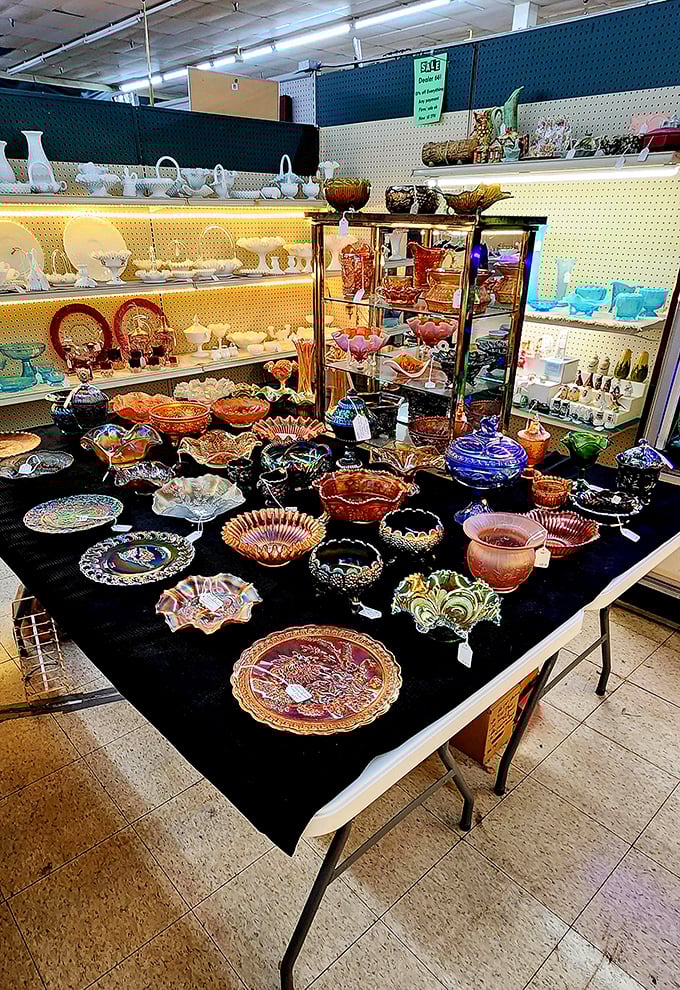 A kaleidoscope of carnival glass and vintage dishware creates a hypnotic display that would make your grandmother swoon.