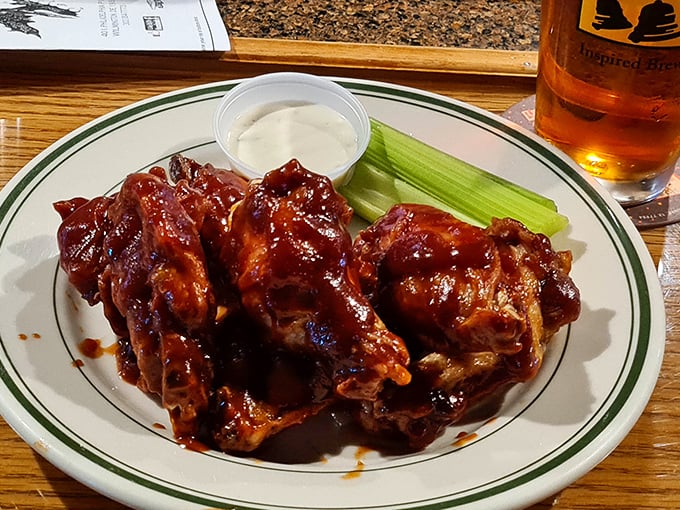 Wings glazed with sauce so sticky you'll need three napkins minimum. Worth every finger-licking, chin-wiping moment of delicious shame.