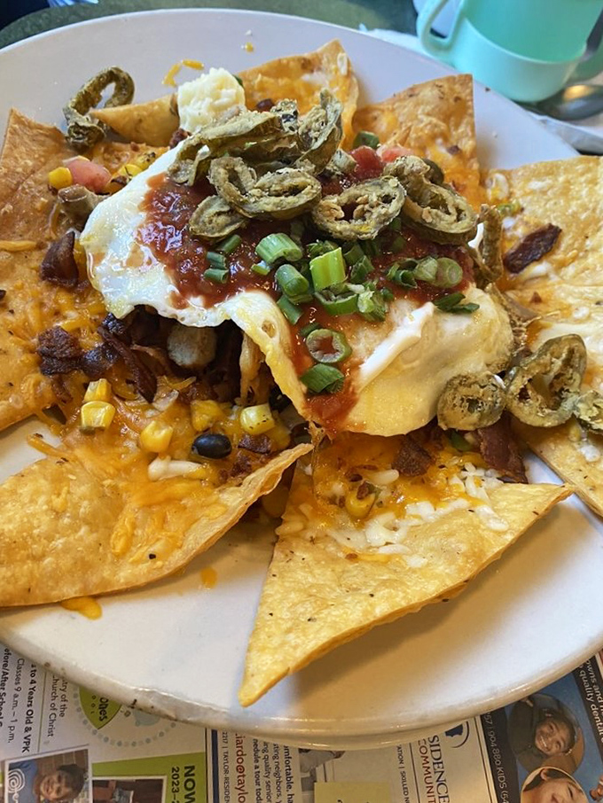 Nachos that don't mess around. Loaded with toppings and fried jalapeños, this plate demands to be shared—or defended vigorously from fork-wielding friends.