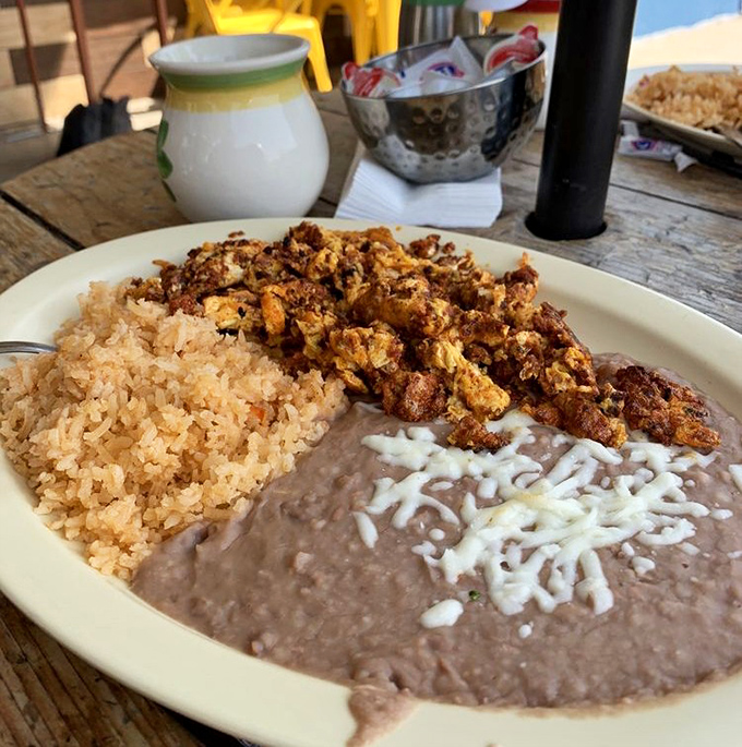 Rice, beans, and chorizo—the holy trinity of Mexican breakfast comfort that makes waking up early almost worth it.