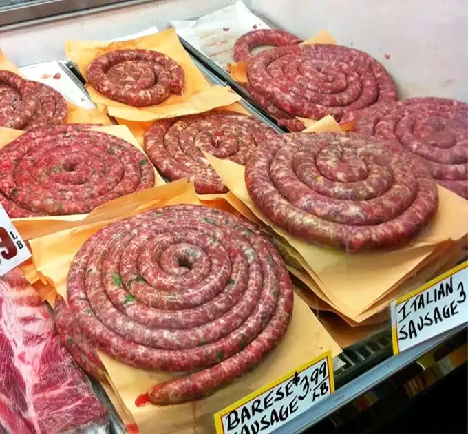 These homemade sausages, coiled like delicious meat watches, contain more authentic Italian seasoning than an episode of "The Sopranos."