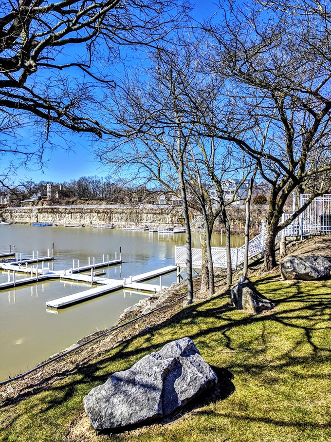 Winter's bare branches frame the marina's peaceful off-season slumber—a reminder that even vacation spots need their own vacations occasionally.