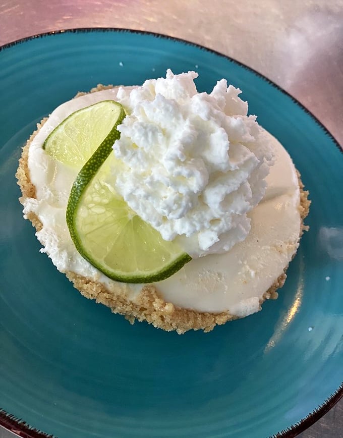 Key lime pie that strikes the perfect balance between tart and sweet. That lime slice isn't just garnish – it's a promise of authentic Florida flavor.