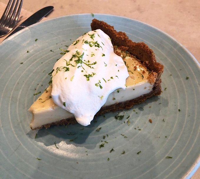 Key Lime Pie that strikes the perfect balance between tart and sweet—topped with a cloud of whipped cream that makes you forget all your troubles.