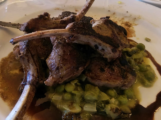These lamb chops aren't just cooked—they're respected. Perfectly seared and resting on a bed of vegetables that complement rather than compete.