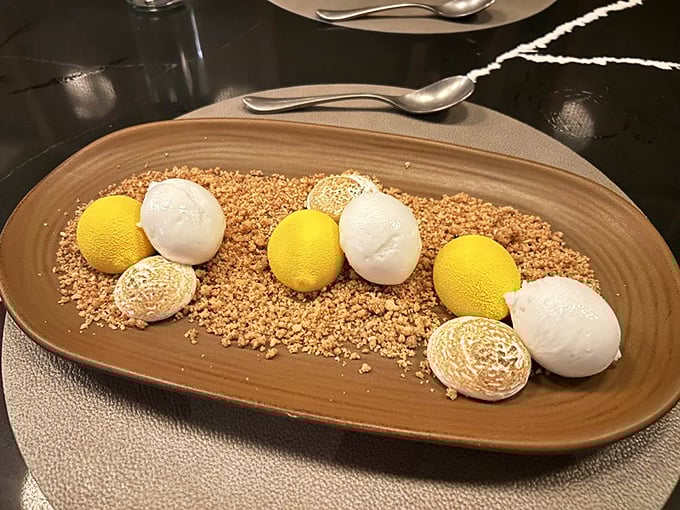 Lemon meringue dessert that looks like edible sunshine, complete with artistic flourishes that Instagram dreams are made of.