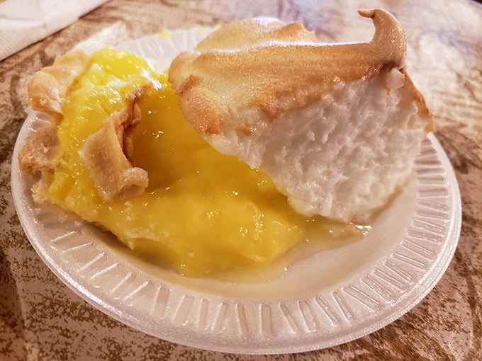 This lemon meringue pie isn't just dessert—it's architecture. Cloud-like meringue towers over sunshine-yellow filling that strikes the perfect sweet-tart balance. 