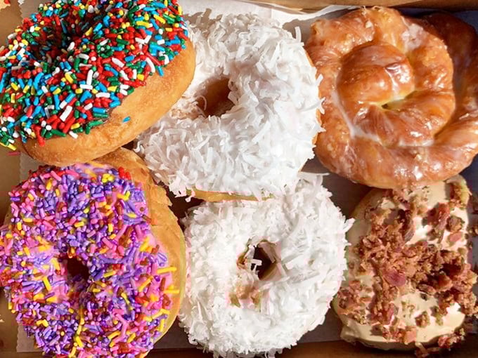 The rainbow sprinkle and coconut varieties aren't just donuts—they're edible works of art that somehow taste even better than they look.