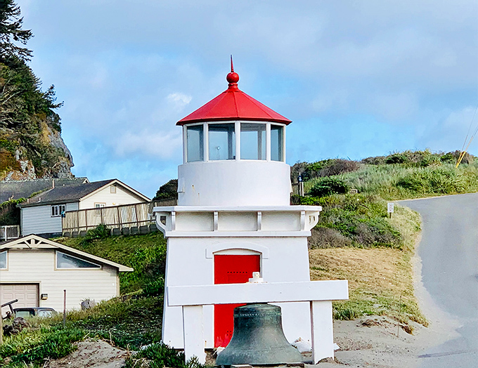 Not all heroes wear capes—some wear red conical hats. This charming lighthouse has guided mariners safely home for generations.