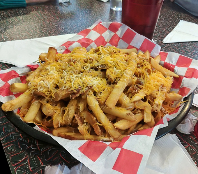 These aren't just cheese fries—they're a golden monument to indulgence. Crispy, cheesy, and impossible to stop eating once you start.