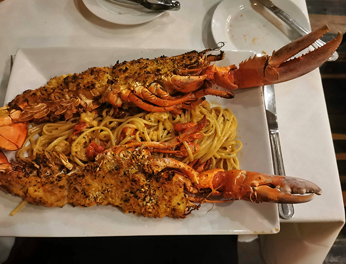 When lobster decides to get fancy, this is what happens—a symphony of seafood and pasta that makes spaghetti and meatballs feel underdressed.